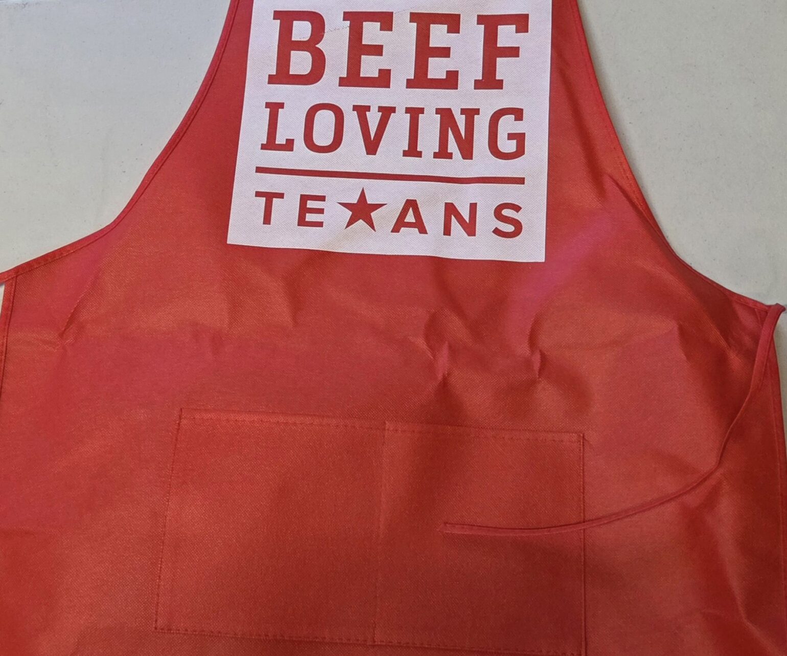 Apron – Disposable | Beef Loving Texans | Beef Loving Texans is your ...